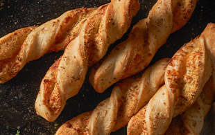 Garlic Parmesan Twists™ - Round Table Pizza
